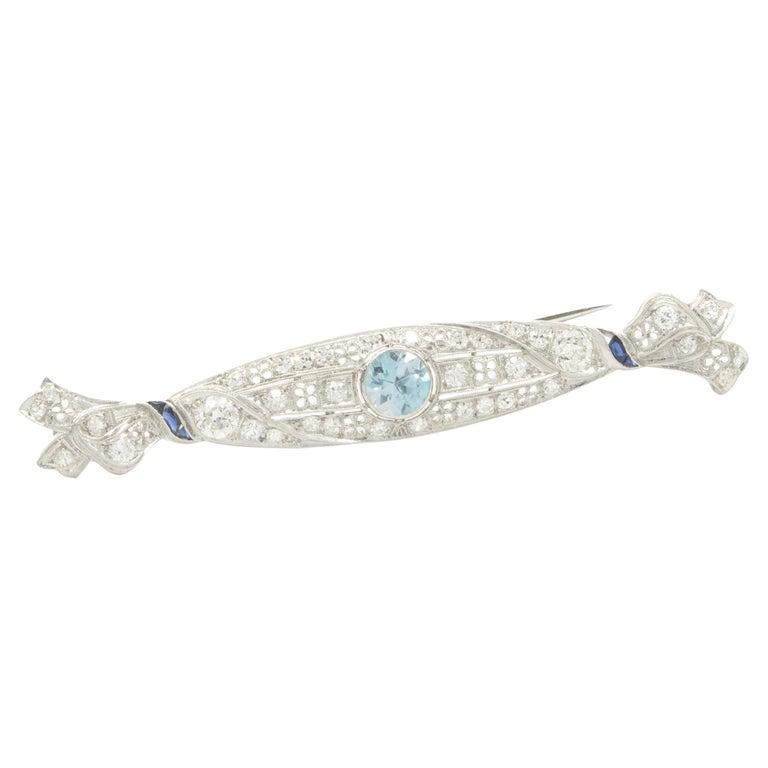 Platinum Vintage Art Deco Blue Zircon, Diamond, and Sapphire Stick Pin ...