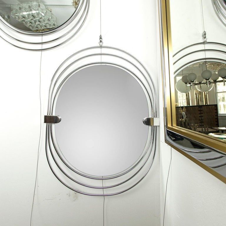 Polished Stainless Steel Unusual Oval Mirror at 1stDibs