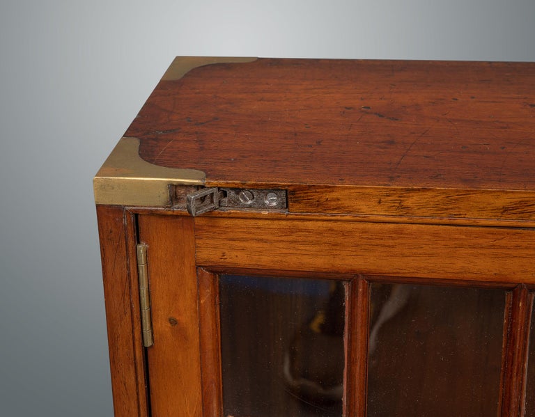Polished Teak Folding Campaign Bookcase For Sale at 1stDibs