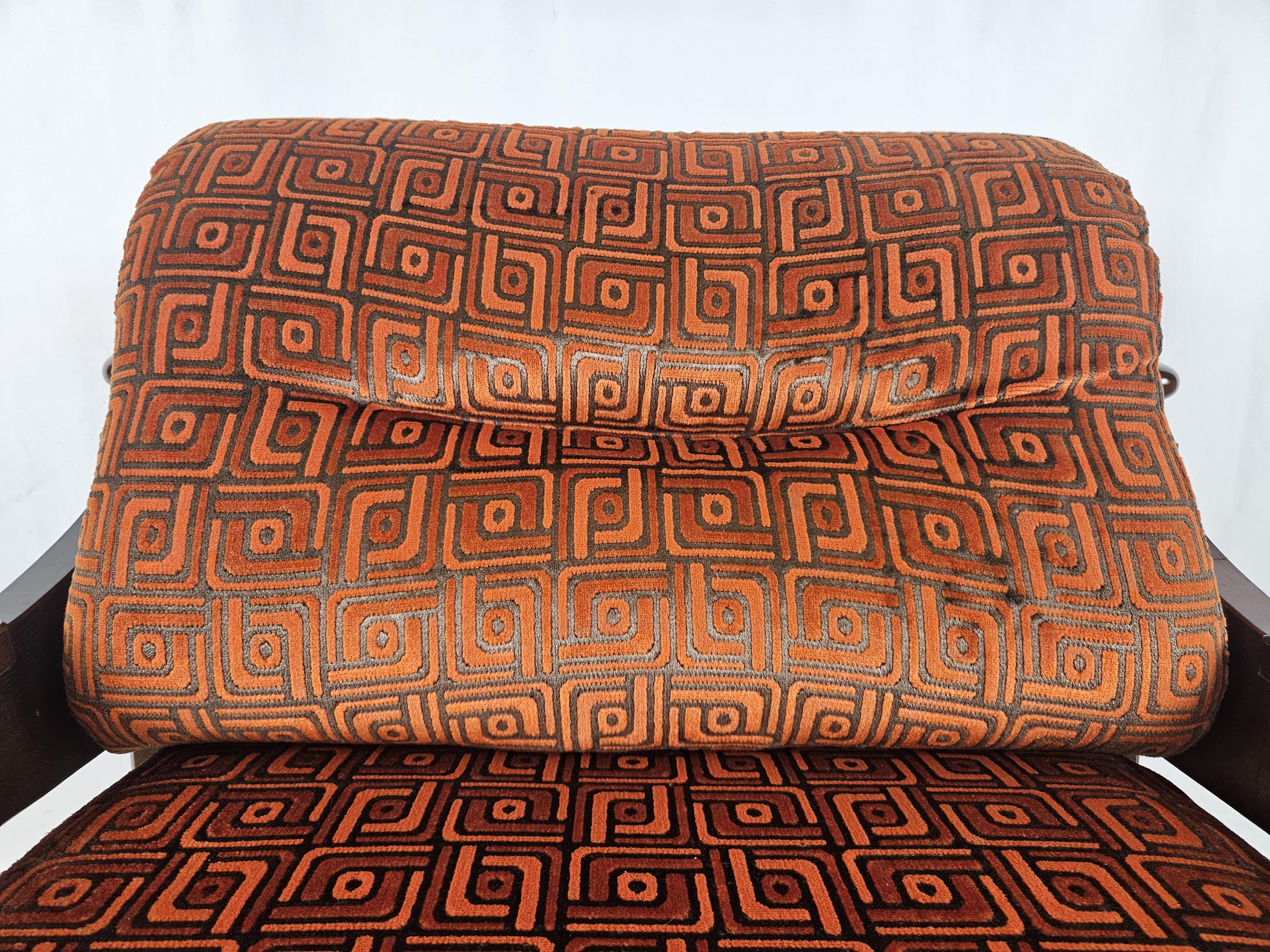 Rustic wooden armchair with designer fabric For Sale at 1stDibs