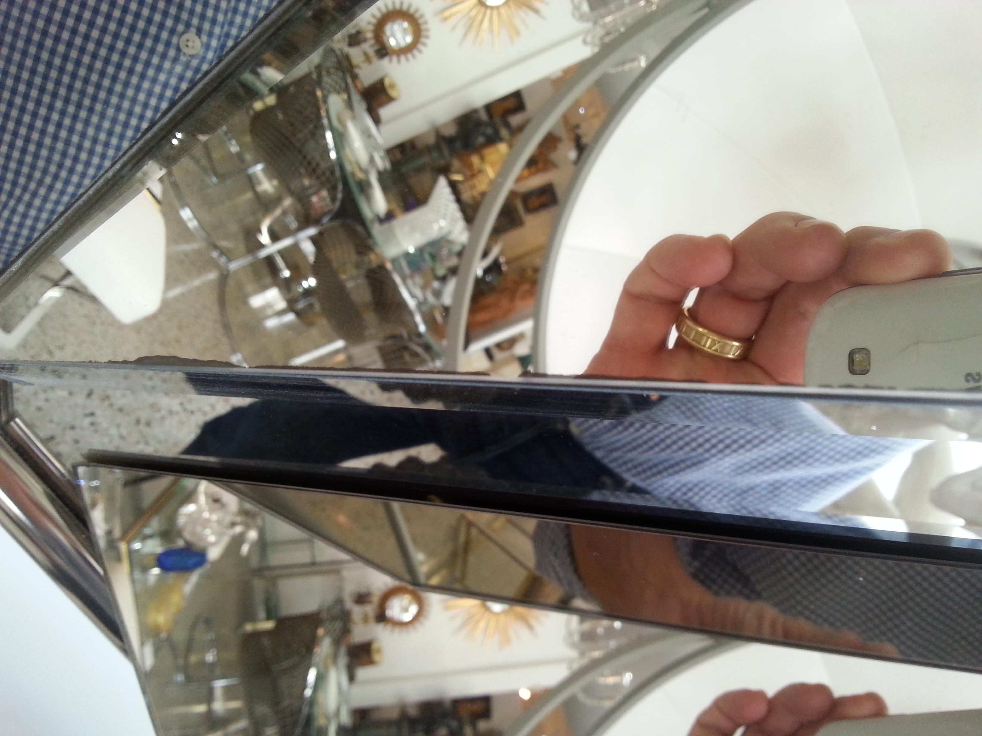 Polygon Form Wall Mirror with Bronze Coloration at 1stDibs