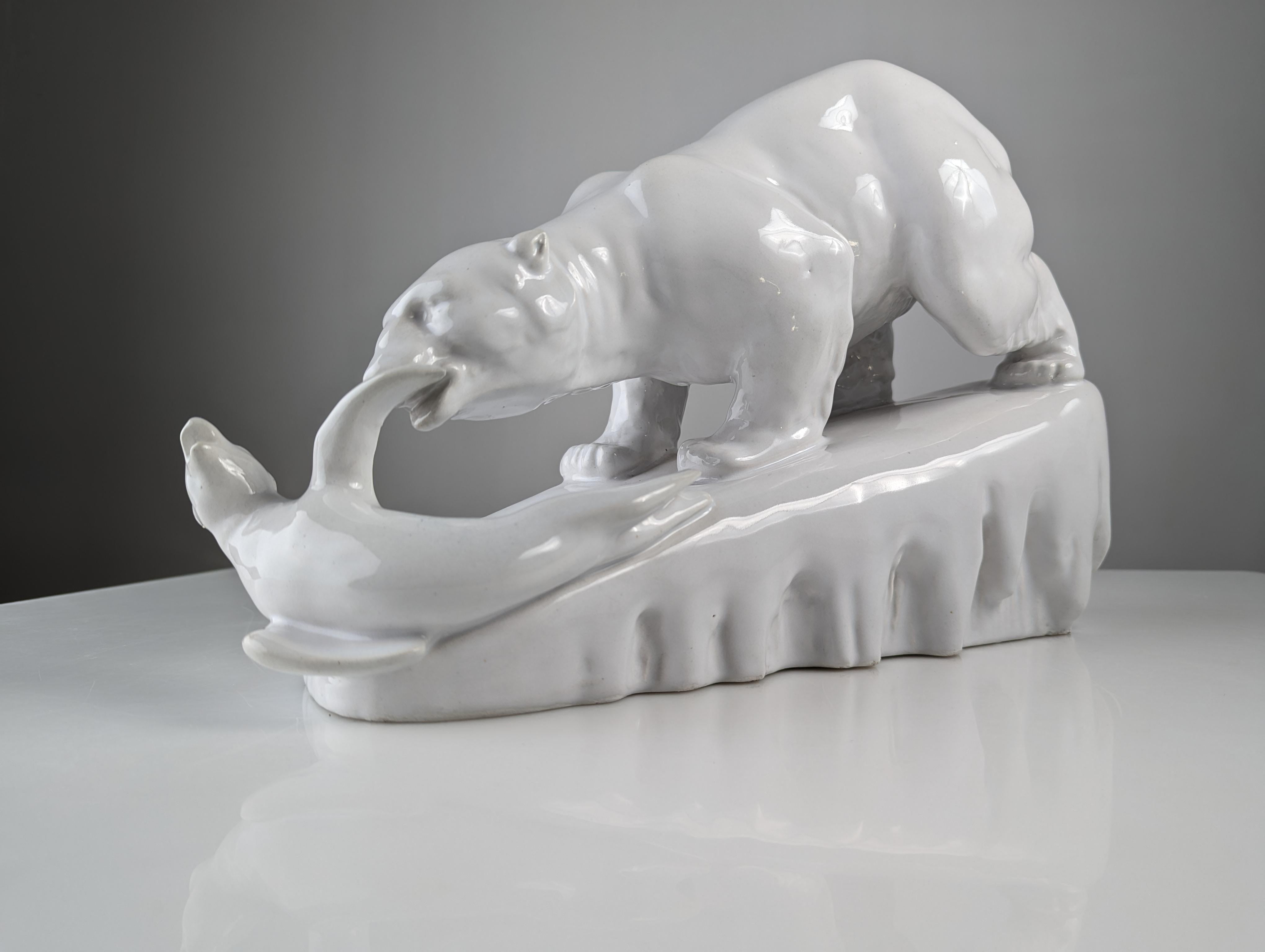 Porcelain sculpture polar bear and seal on Iceberg For Sale at 1stDibs