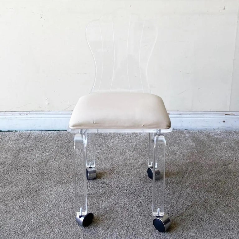 Postmodern Lucite Accent Chair on Wheels at 1stDibs