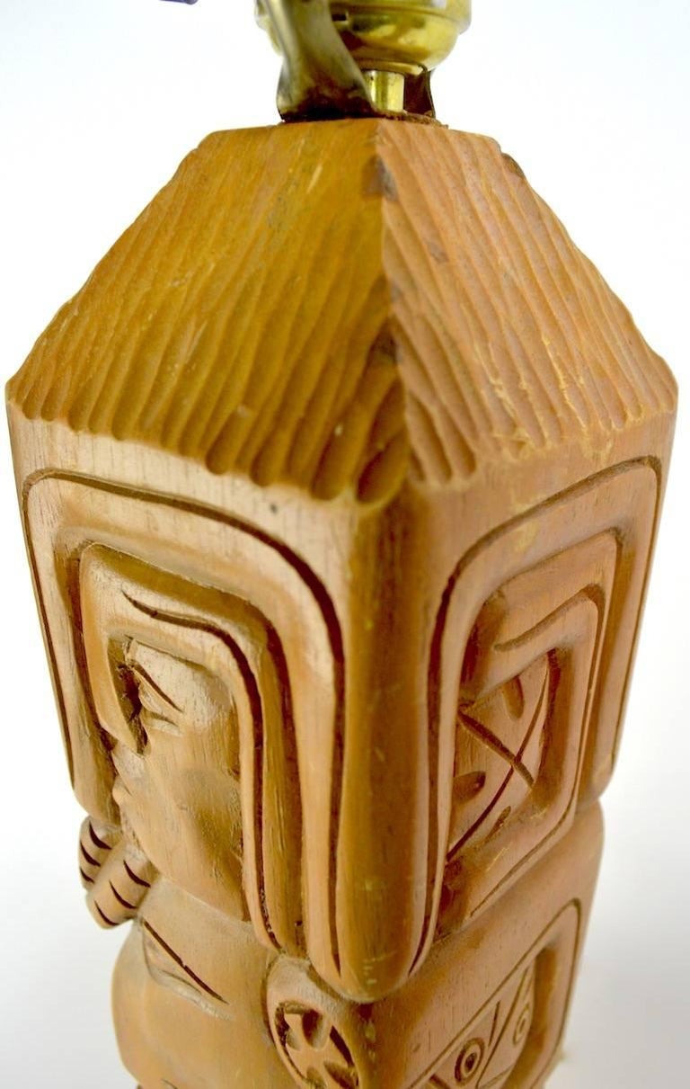 Pair of Aztec Motif Carved Wood Tiki Lamps For Sale at 1stDibs