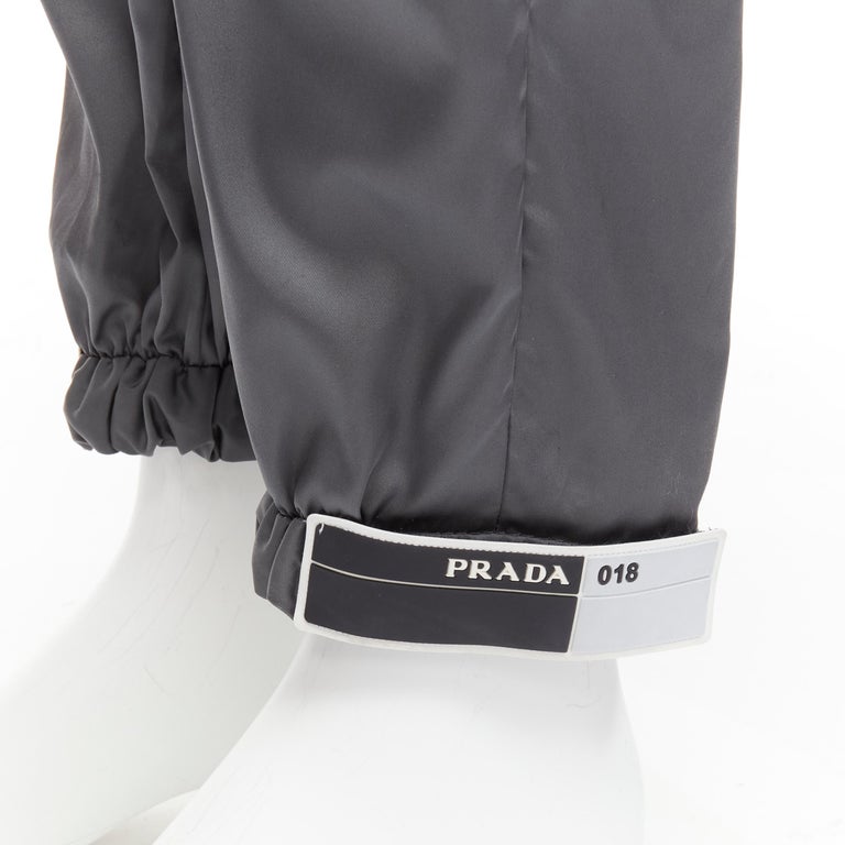 PRADA 2018 logo rubber tab grey gabardine nylon technical jogger pants ...