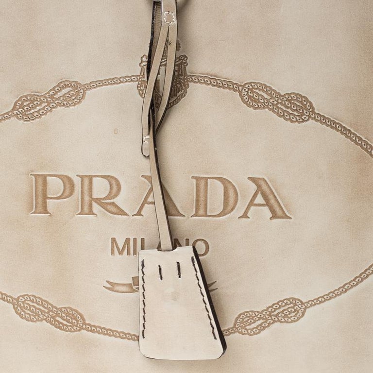 Prada Beige Logo Print Patent Leather Frame Top Handle Bag For Sale at ...