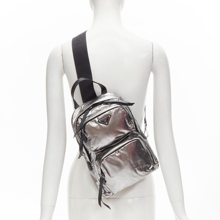 PRADA metallic silver triangle logo small sling backpack bag at 1stDibs
