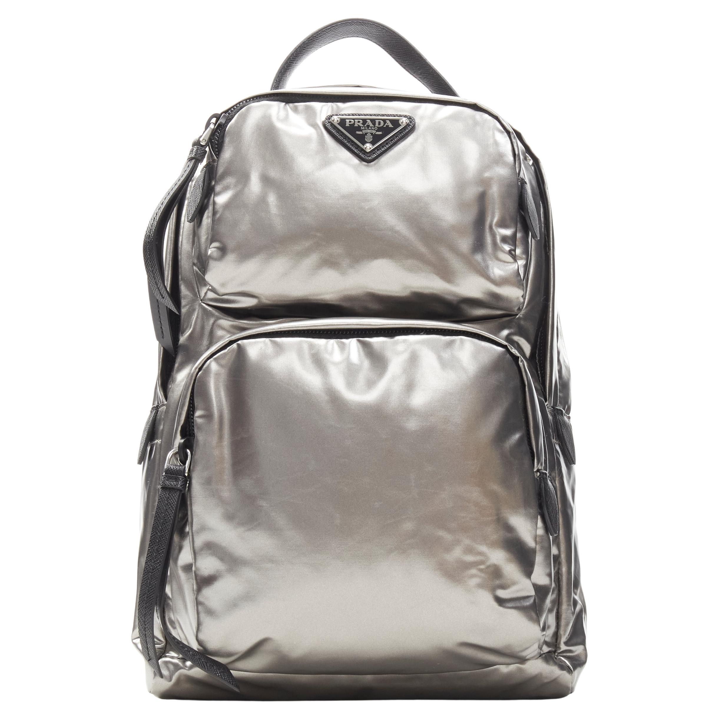 PRADA metallic silver triangle logo small sling backpack bag at 1stDibs
