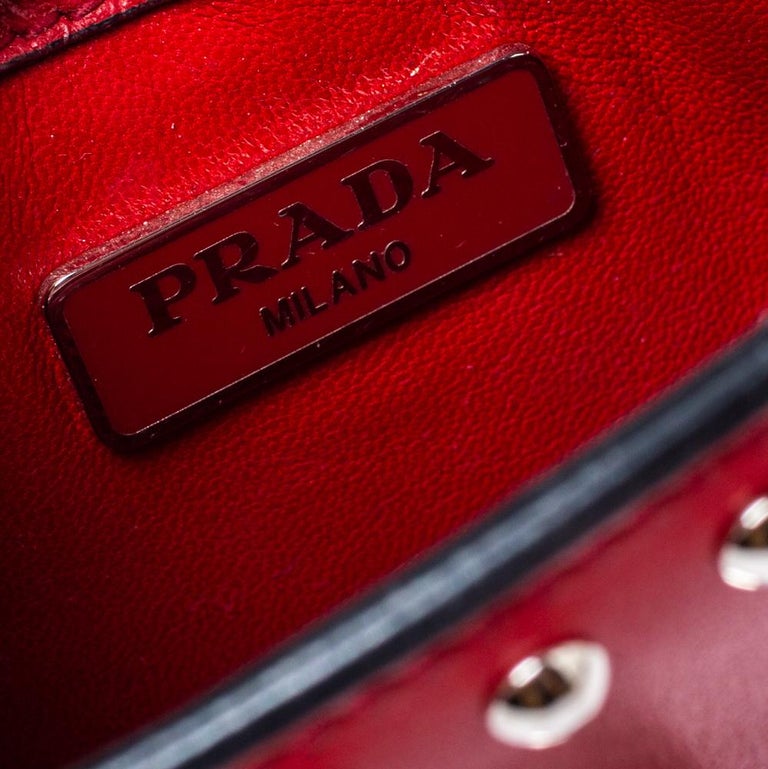 Prada Red Leather Studded Turnlock Clutch For Sale at 1stDibs