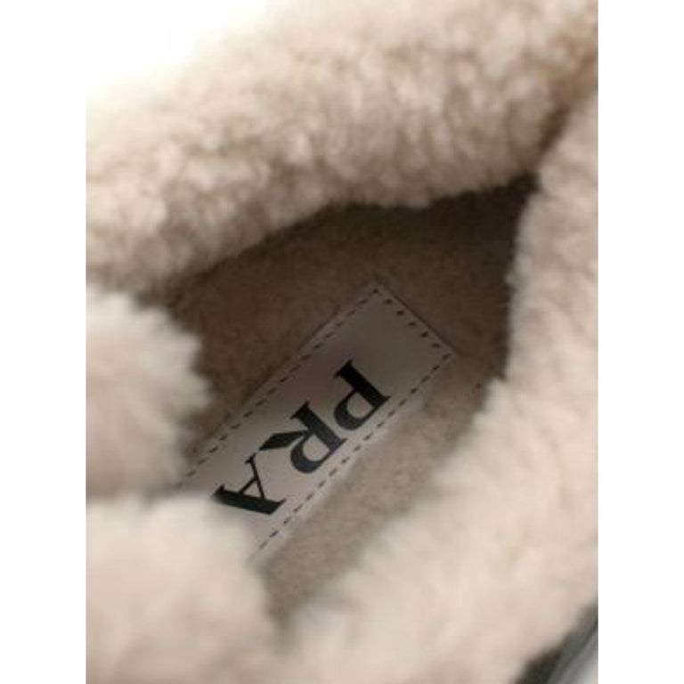 Prada Shearling Lined White Leather Wheel Sneakers For Sale at 1stDibs