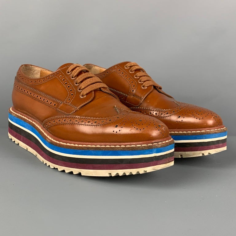 PRADA Size 6.5 Tan Leather Perforated Wingtip Shoes For Sale at 1stDibs