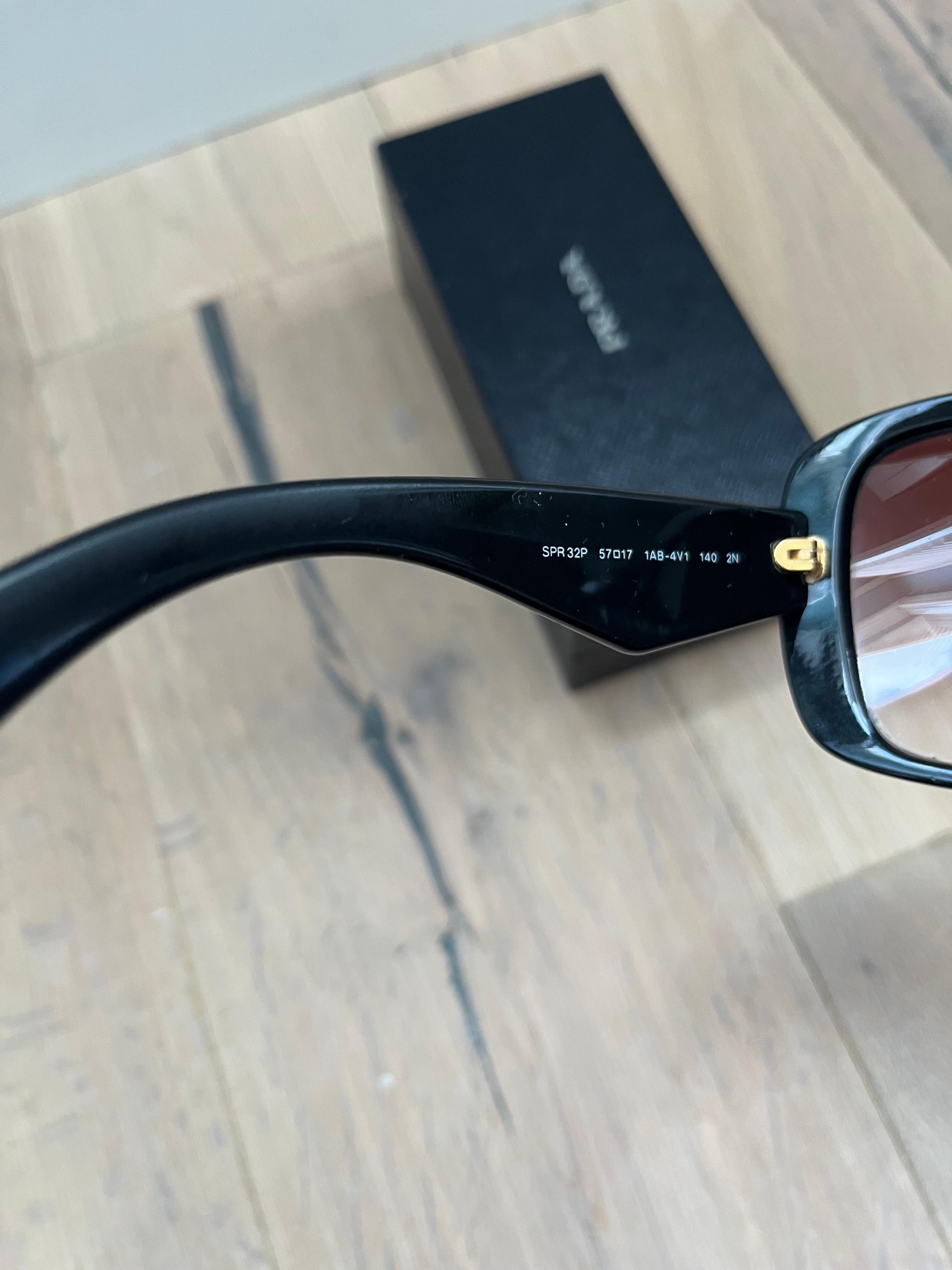 Prada Triangle Logo Mask Black Sunglasses For Sale at 1stDibs