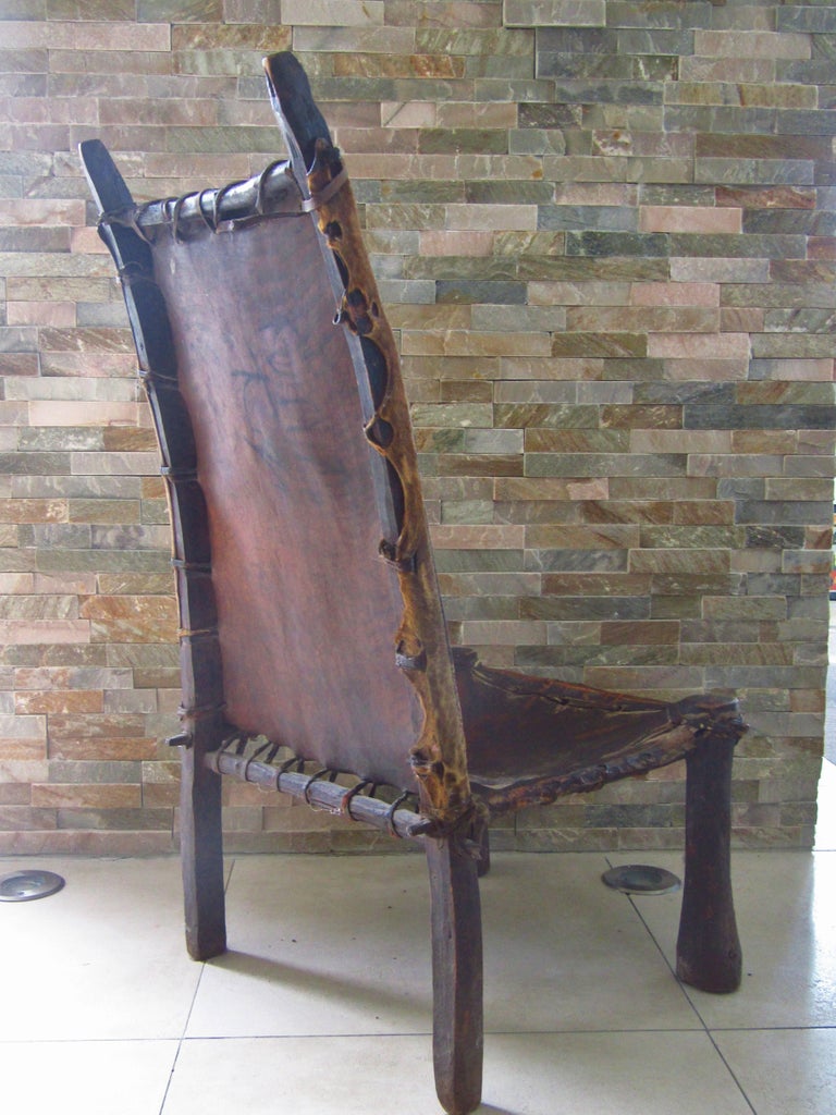 Primitive African Chair Wood and Leather, circa 1900 at 1stDibs