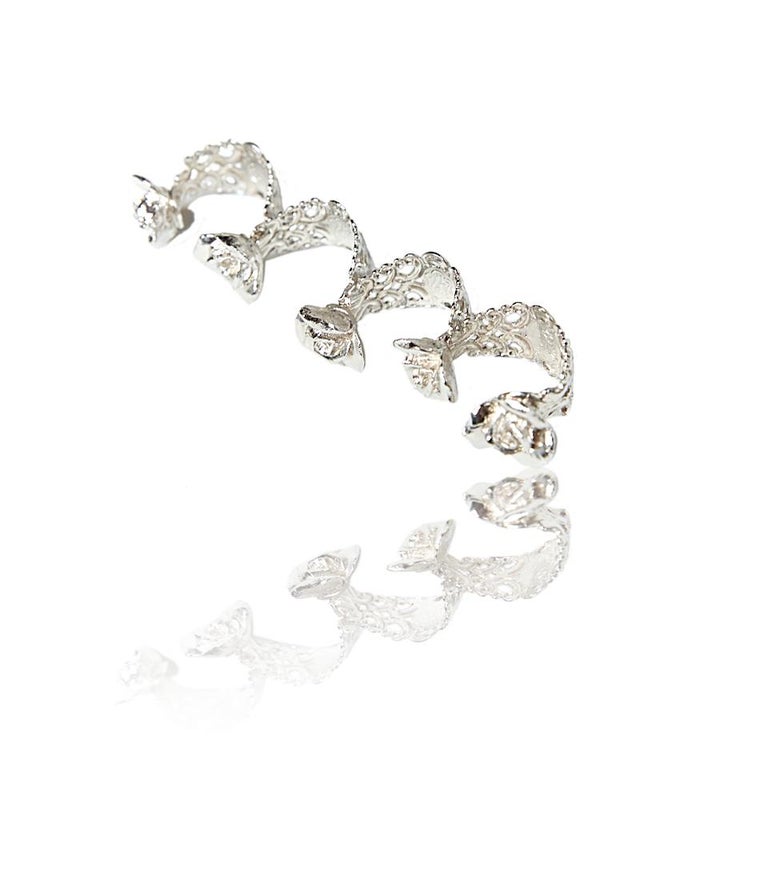 Quad knuckle rosette RING (Rodium plated) For Sale at 1stDibs