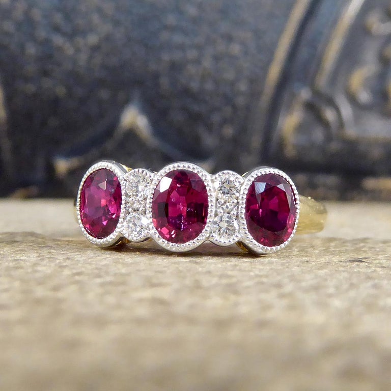 Quality Burma Ruby Three Stone Ring with Diamond Spacers in 18ct Gold For Sale at 1stDibs