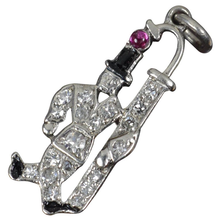 Quirky Art Deco Platinum Ruby Cabochon Diamond and Black Enamel Charm ...