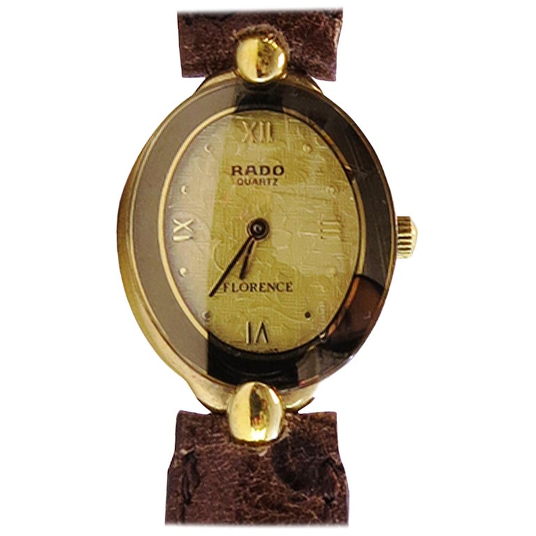 Rado Ladies Watch Whit 18 Karat Plated Yellow Face and Sapphire Crystal ...