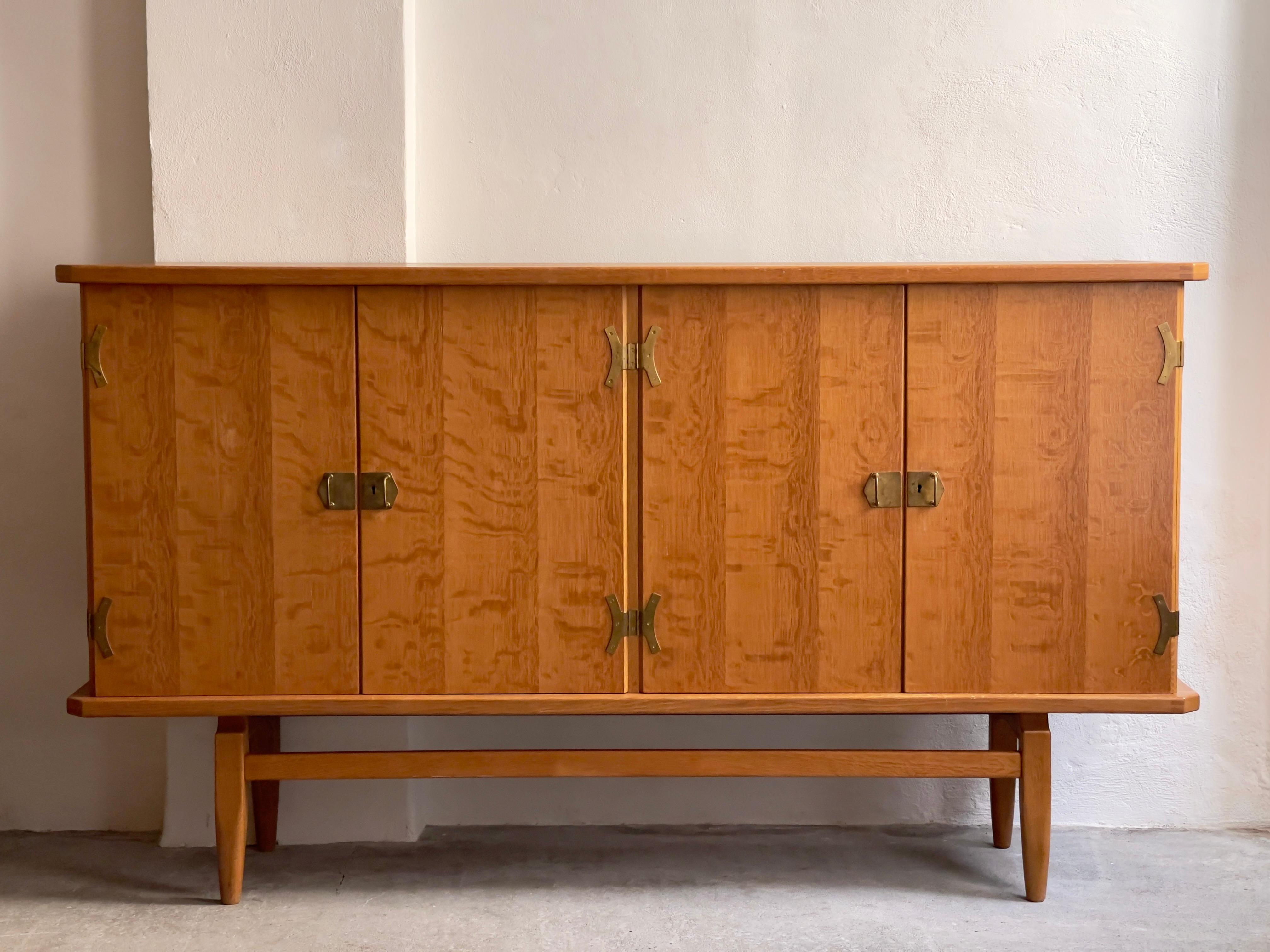 Rare 1970s Danish Sideboard in oak and brass brackets design by Henning ...