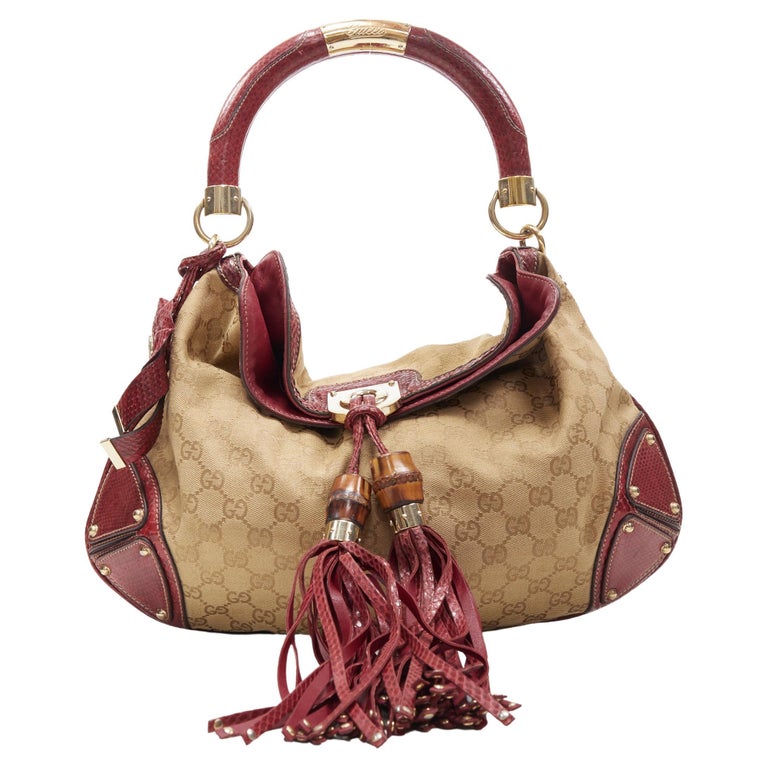 rare GUCCI Unicef Indy brown GG monogram red leather bamboo flap ...