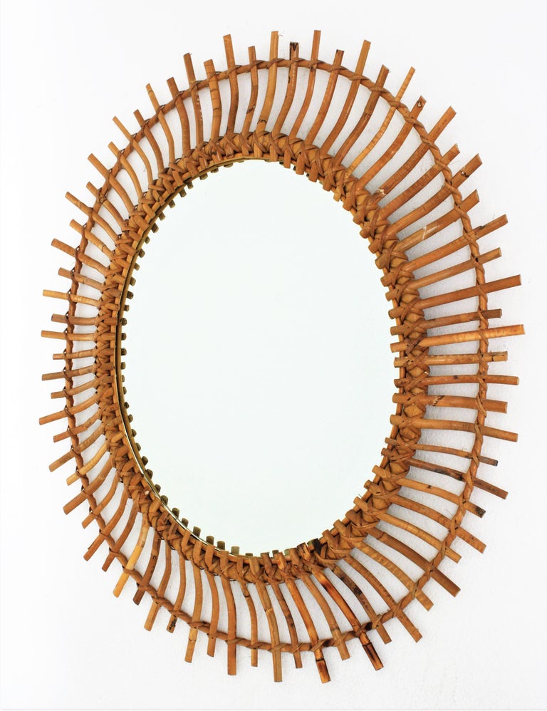 Rattan Bamboo Oval Sunburst Mirror For Sale at 1stDibs