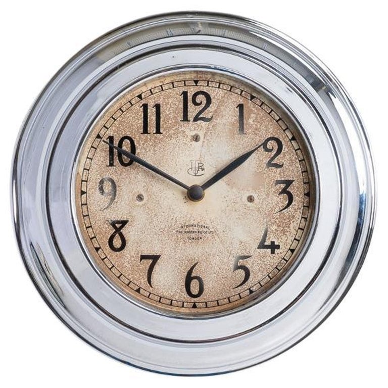 silver chrome wall clock