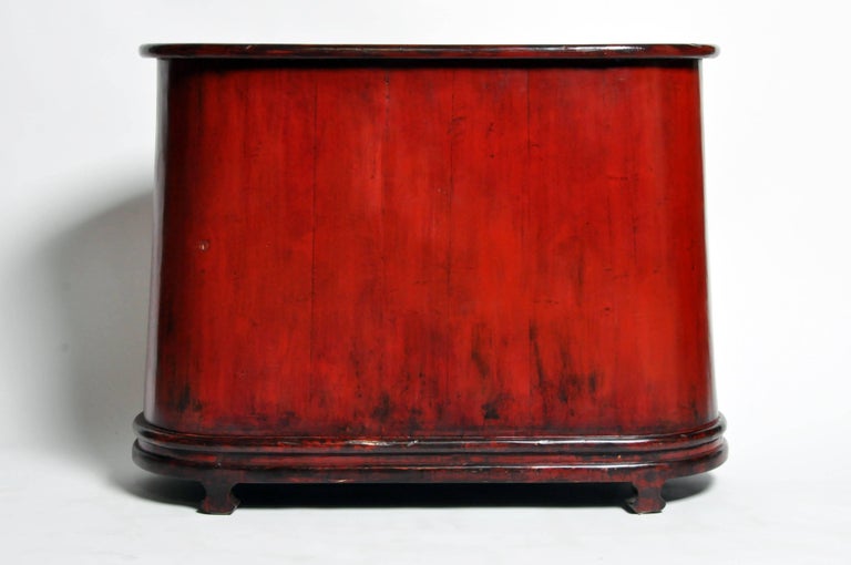Red-Lacquered Chinese Oval Chest with Three Drawers and a Shelf at 1stDibs