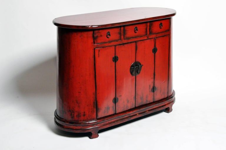 Red-Lacquered Chinese Oval Chest with Three Drawers and a Shelf at 1stDibs