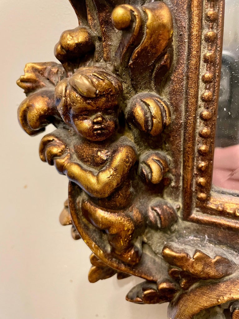 Regency Style Gilt Cherub Mirror For Sale at 1stDibs