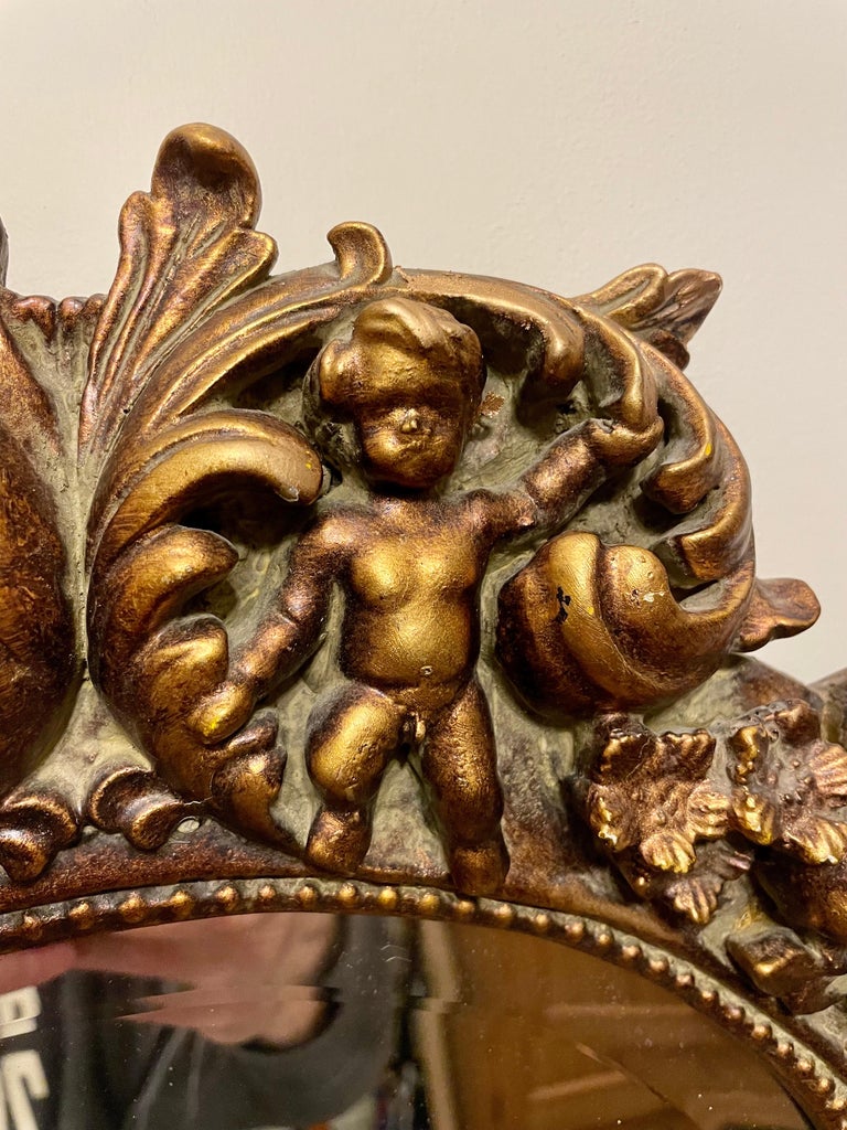 Regency Style Gilt Cherub Mirror For Sale at 1stDibs