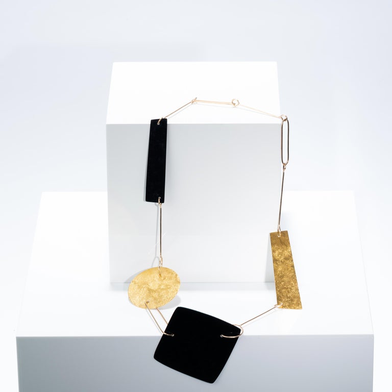 Reversible 9k Gold Patinated Steel and Hammered Silver Gold Leaf Shapes ...