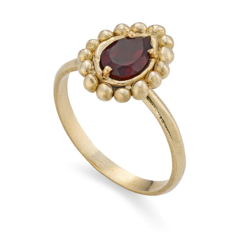 Rhea Ring with Garnet, 18 Karat Yellow Gold For Sale at 1stDibs