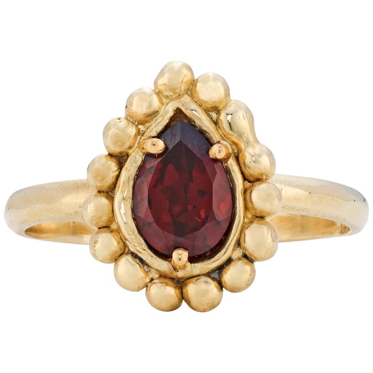 Rhea Ring with Garnet, 18 Karat Yellow Gold For Sale at 1stDibs