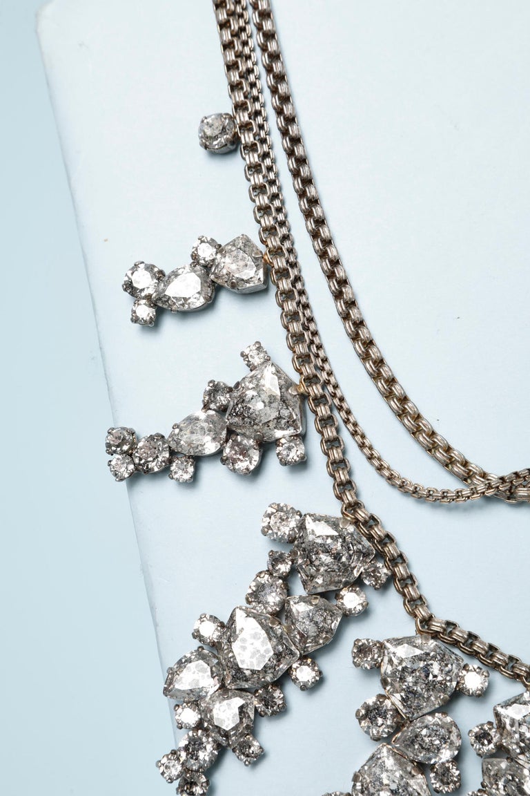 Rhinestone and patinated metal chain sautoir "On aura tout vu ...