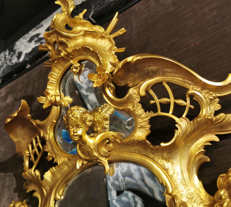 Rich Napoleon III rococo style mirror in gilted bronze For Sale at 1stDibs