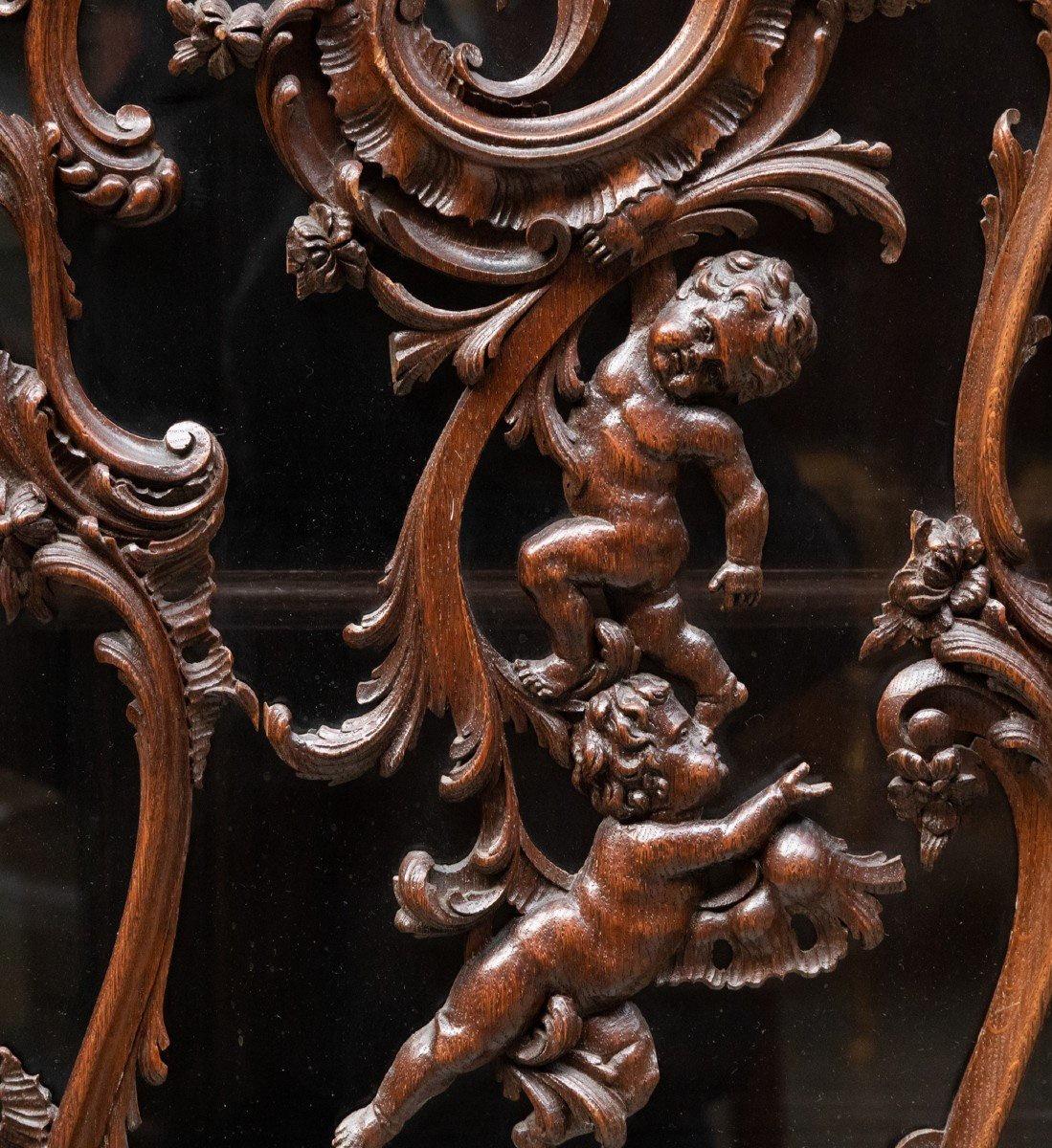 Richly carved 19th century cabinet with claw feet. For Sale at 1stDibs