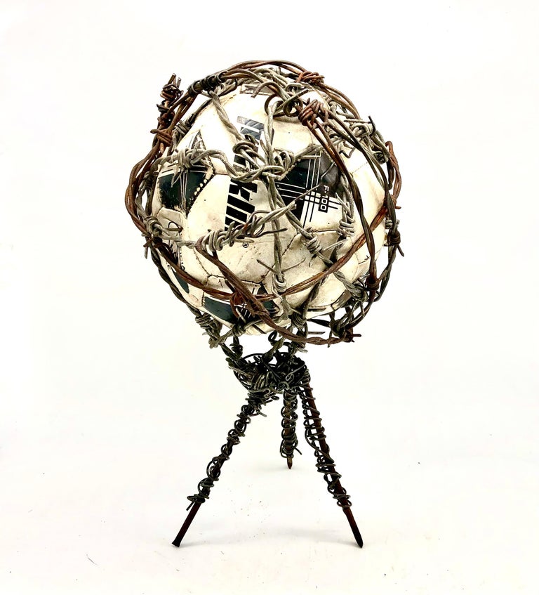 FIFA - Found Object Sculpture with Deflated Soccer Ball and Barbed Wire ...