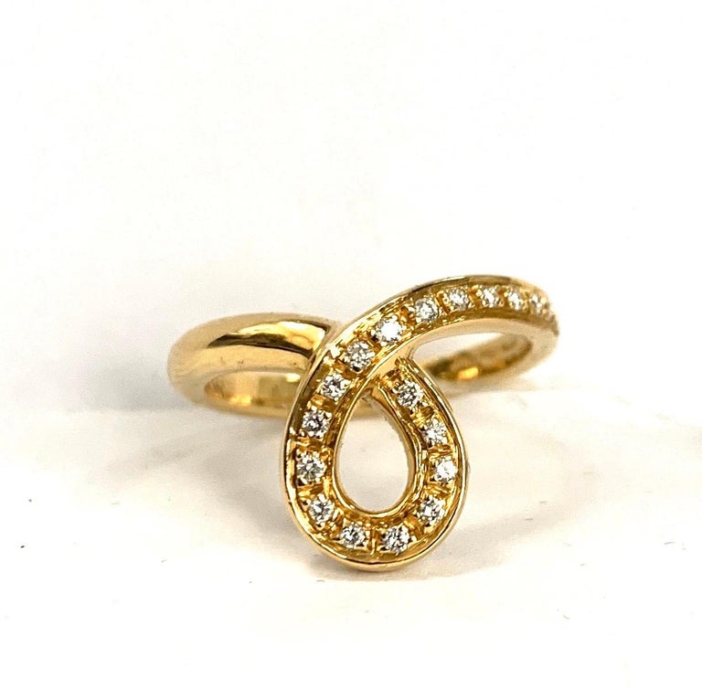 Ring from the Collection "Essence" 18 Karat Yellow Gold and Diamonds ...
