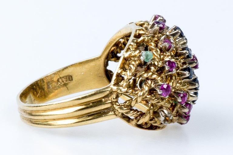 Ring in 18 carat yellow gold with a dome shape with semi-precious ...