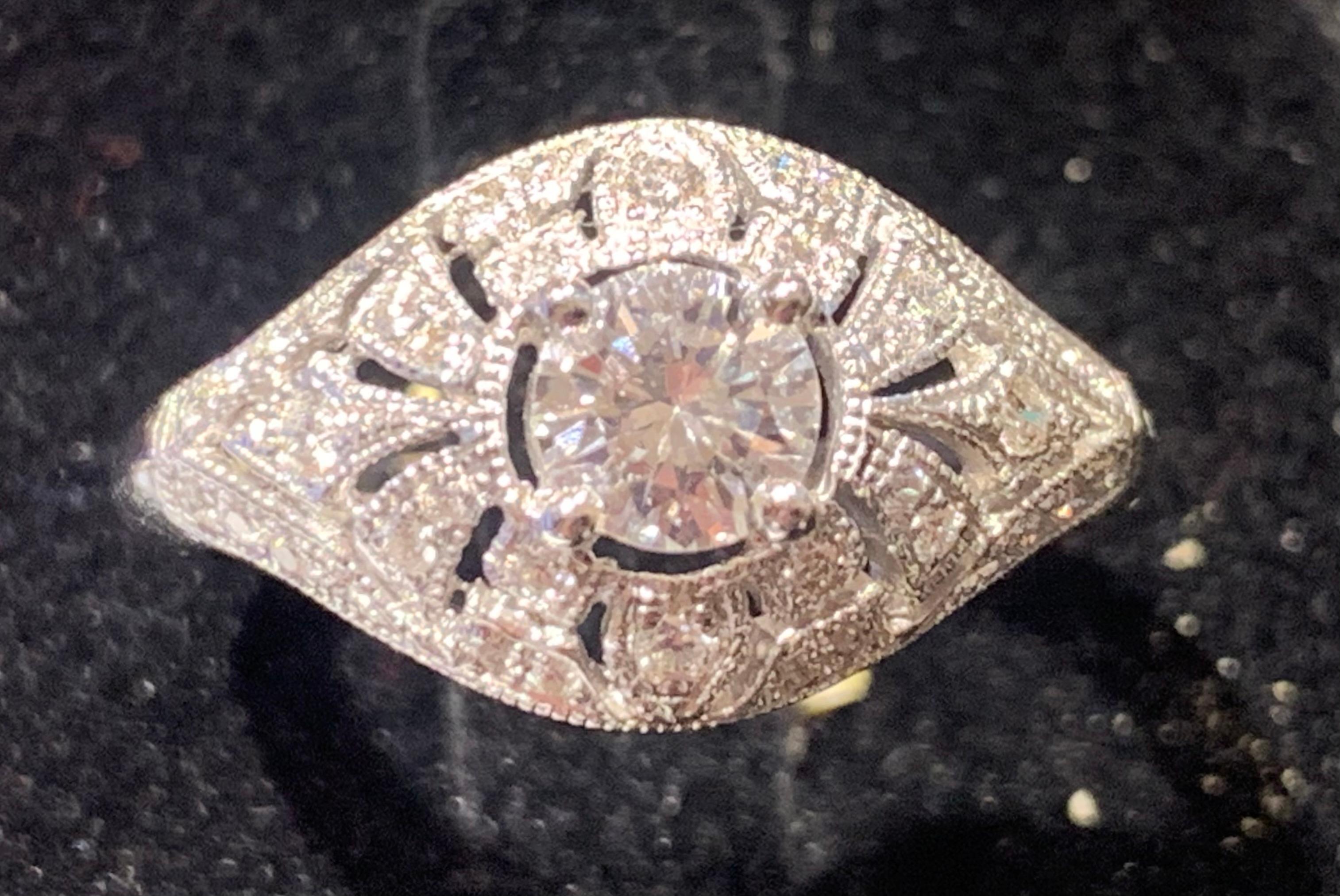 Ring in 18k White Gold Set with a Central Diamond Surrounded Paving ...