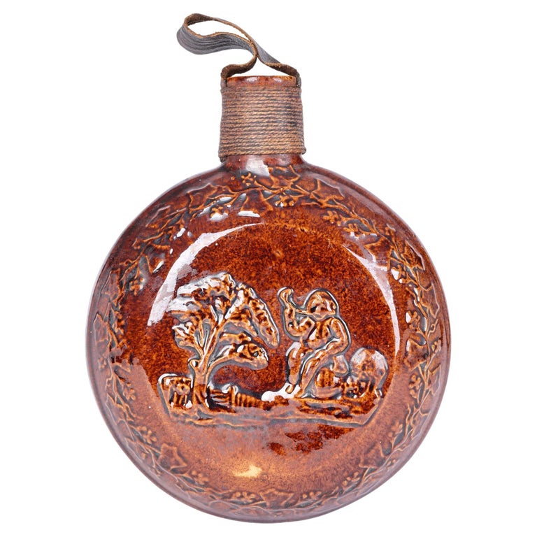Rockingham Rare Treacle Glazed Smoking Scene Pottery Flask For Sale at ...