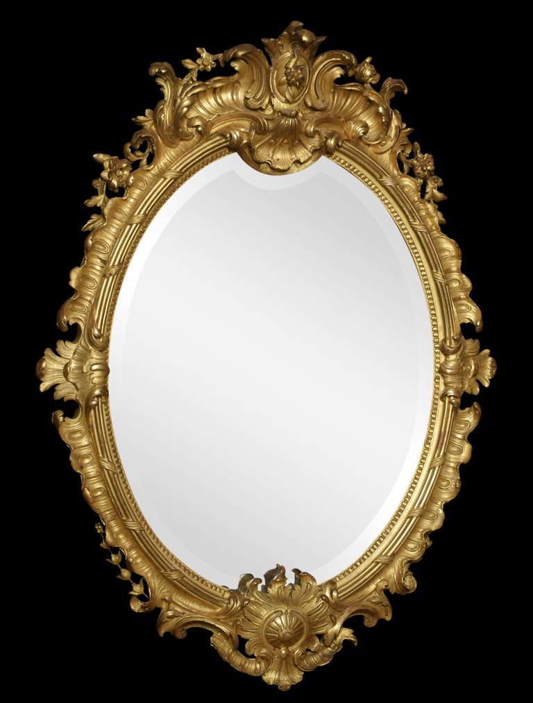 Rococo Revival Giltwood Oval Wall Mirror at 1stDibs