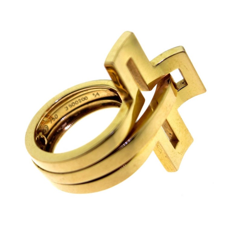 Roger Dubuis “Follow Me” Wave Gold Cross Ring at 1stDibs