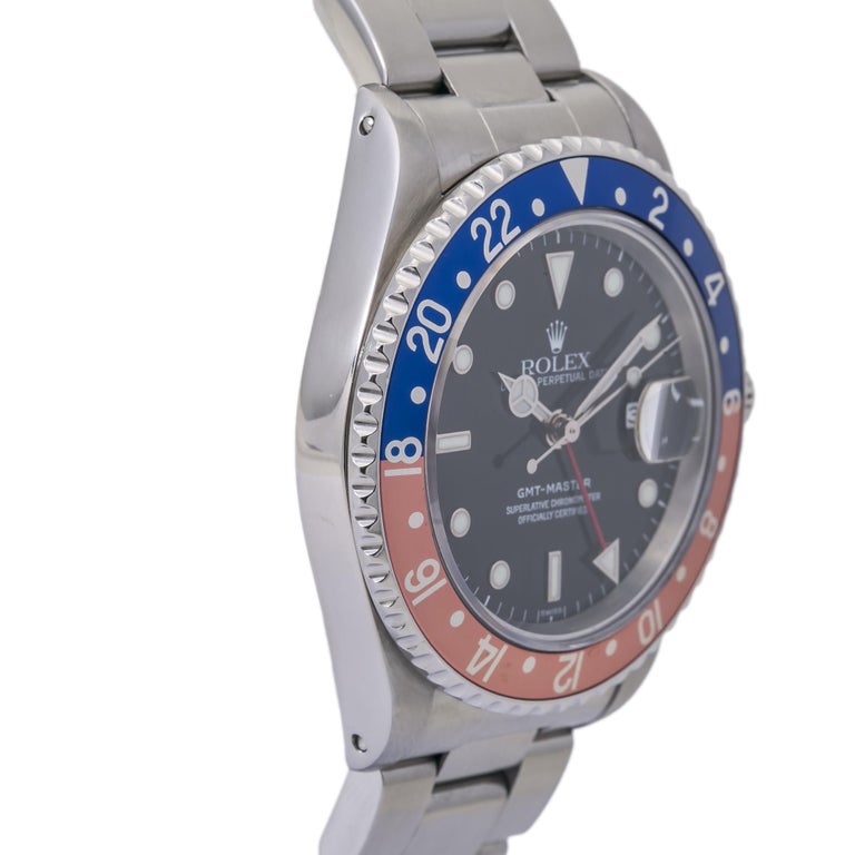 Rolex GMT Master 16700, Black Dial, Certified and Warranty at 1stDibs
