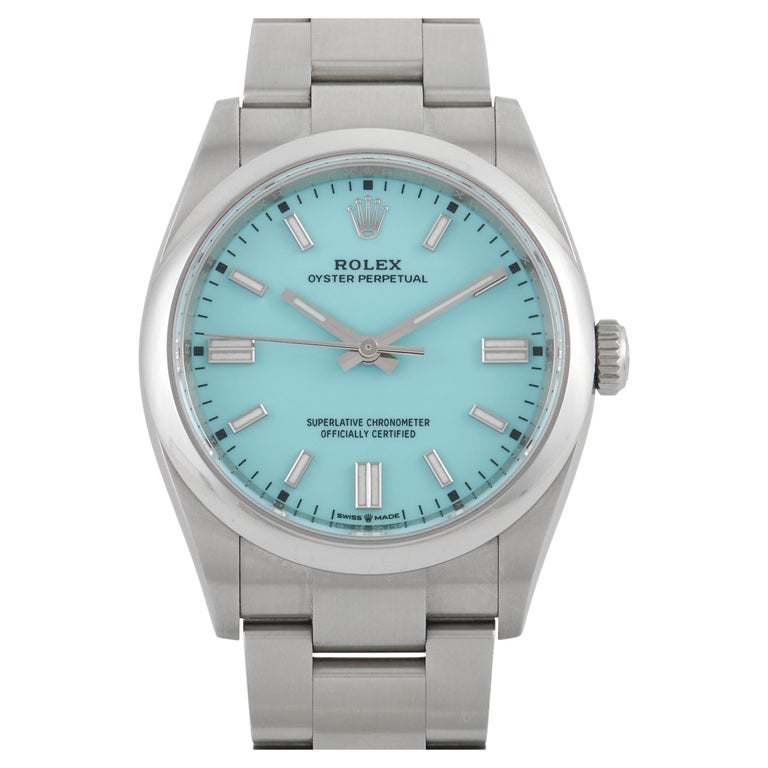Rolex Oyster Perpetual Turquoise Blue Dial Watch 126000 at 1stDibs
