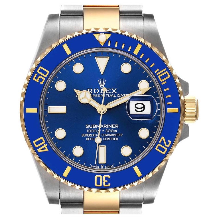 Rolex Montre Submariner 41 en acier, or jaune et cadran bleu, pour ...