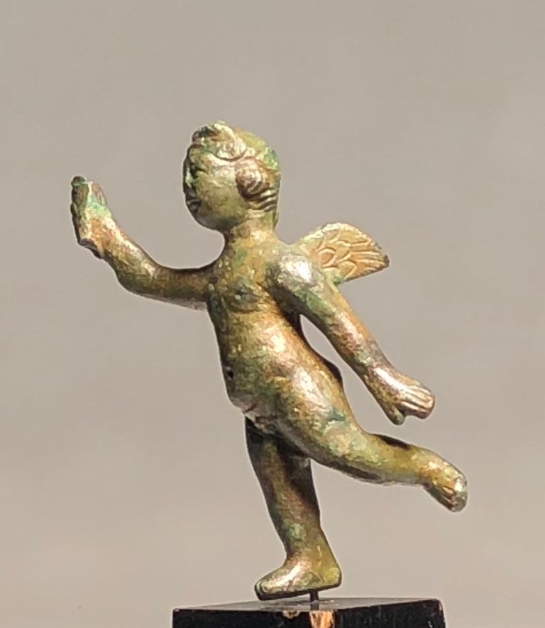 Roman Bronze Statuette of the Young God Eros ‘Cupid’ at 1stDibs