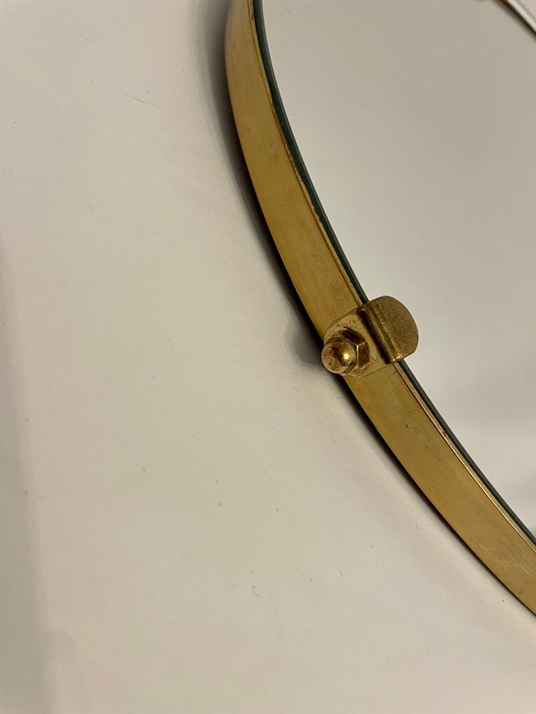 Round Brass Mirror with Loop Top Finial For Sale at 1stDibs