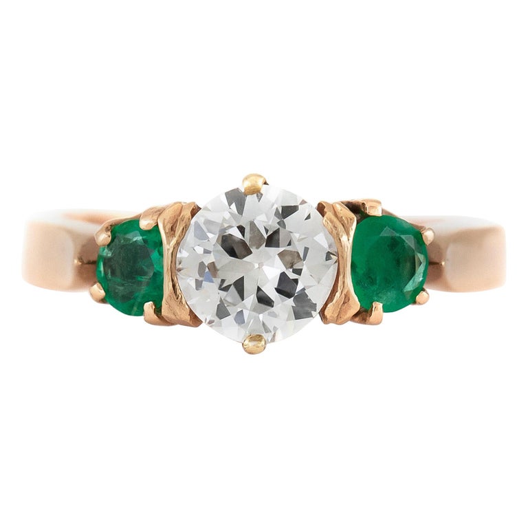 Round Center Diamond with Two Side Round Emerald Ring For Sale at 1stDibs