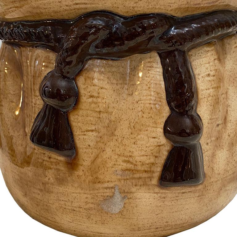 Round Glazed Ceramic Planter with Ribbon Tassel Motif in Brown For Sale ...