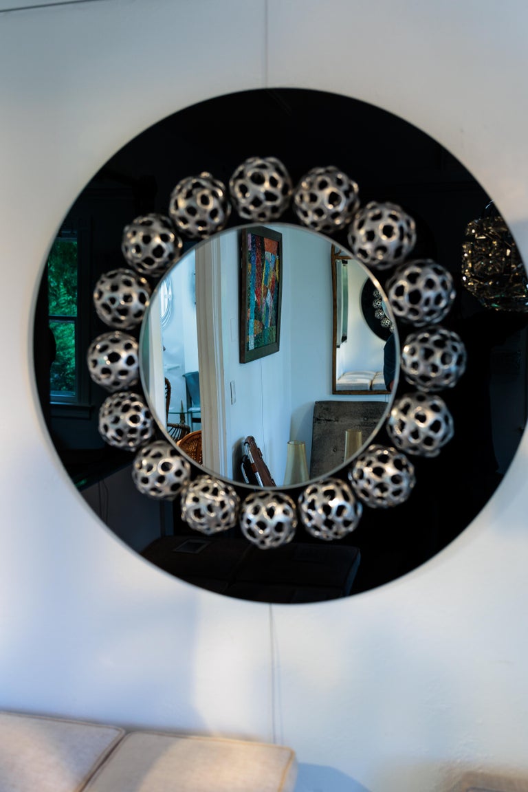 Round Mirror with 17 Metal Perforated Orbs on Black Glass For Sale at ...